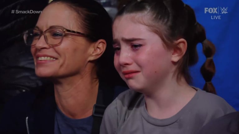 Liv Morgan hugs young fan who cries after her loss to Rhea Ripley on ...